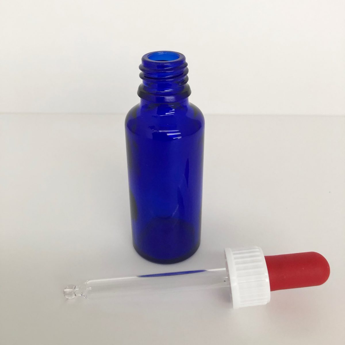 Flacone vetro blu – pipetta rossa vetro – Fiorifabi